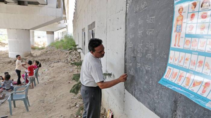 A school under flyover, study room in vendor's cart: stories that help ...