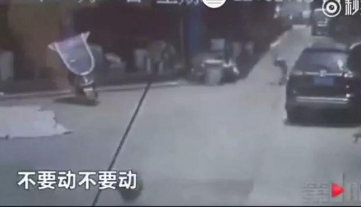 Viral Video: Man runs to save girl falling from building in China ...