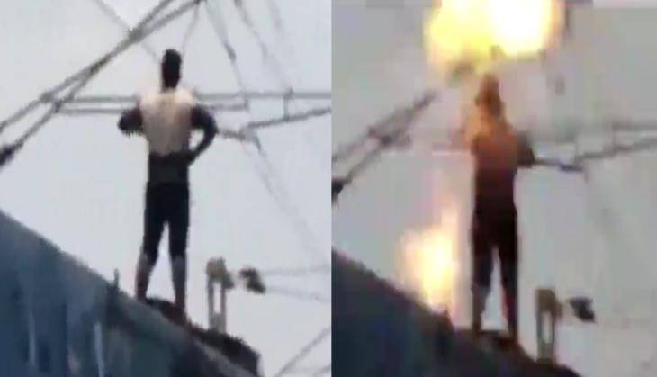 Terrifying Video! Man touches live over head wire at Bengaluru railway ...