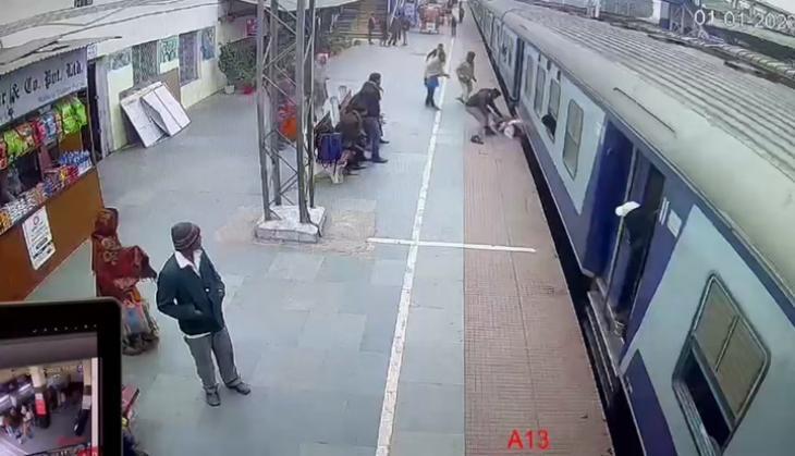 Railway personnel saves man from being run over by train [WATCH ...