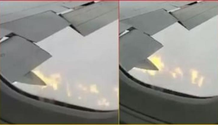 Flight makes emergency landing after flames shoot from wing [WATCH ...