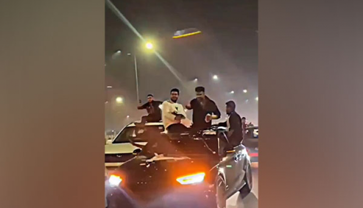 Delhi: One held after viral video shows persons standing on roof of ...